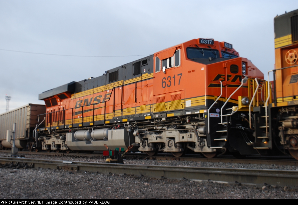 BNSF 6317 rolls south with a loaded coal train as a rear DPU.